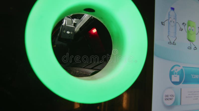 Putting Plastic Bottle in Recycling System, Scanning Barcode in Recycle ...