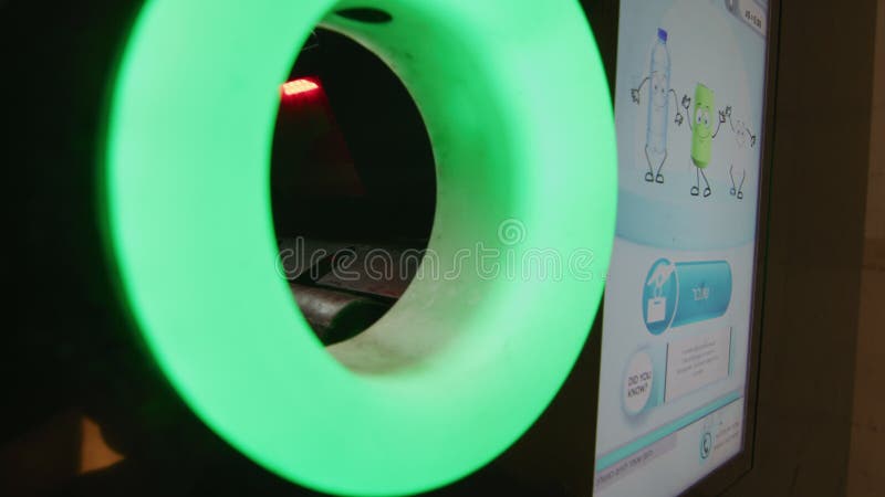 Putting Plastic Bottle in Recycling System, Scanning Barcode in Recycle ...