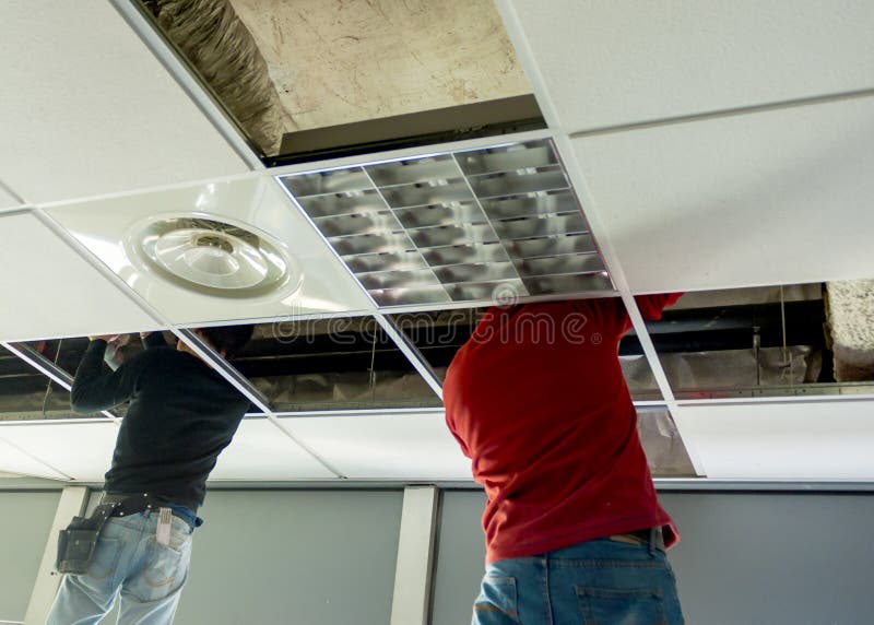 Putting or Repairing Up a Suspended Ceiling Stock Photo - Image of ...