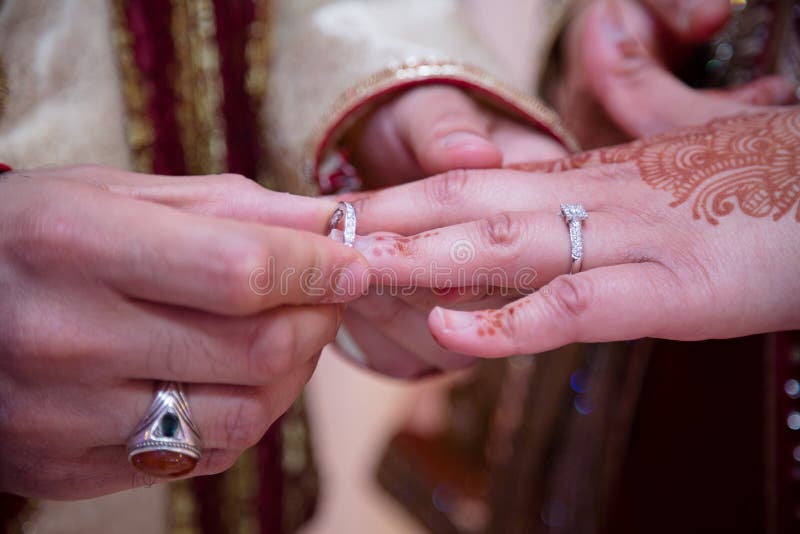 Putting ring on stock image. Image of symbol, people - 64244603