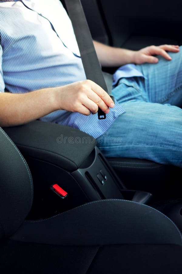 Putting on safety belt stock photo. Image of young, caucasian - 31193450