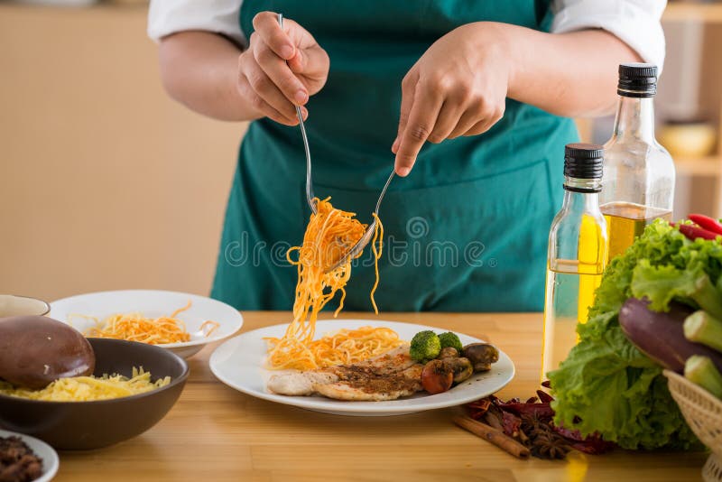 Putting Spaghetti in a Plate Stock Image - Image of putting, cropped ...