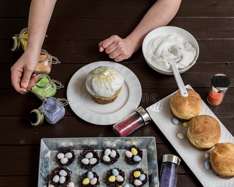 Putting Sparkly Sprinkles on Easter Cake Traditional Decoration and ...