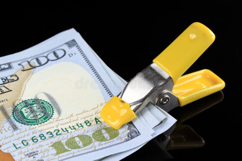 Putting A Squeeze On Your Money - Financial Concept Stock Photo - Image ... Putting A Squeeze On Your Money - Financial Concept Stock Photo - Image ...