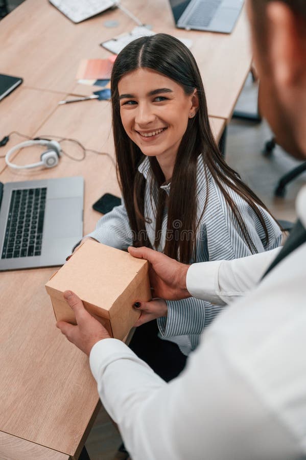 Putting Them on the Table. Man and Woman are with Eco Boxes in the ...