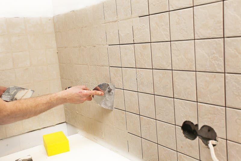 Putting tilles stock image. Image of tile, tool, sponge - 14186775