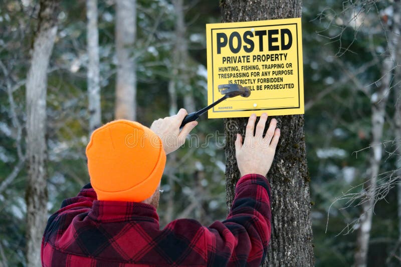 Putting Up a Posted Sign stock photo. Image of fishing - 156169770