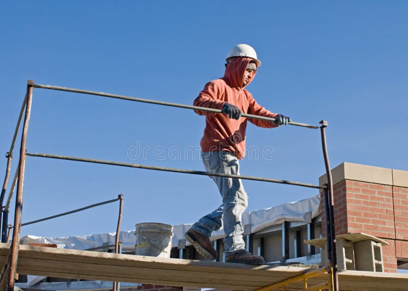 Putting Up Scaffolding stock photo. Image of elevation - 7753830