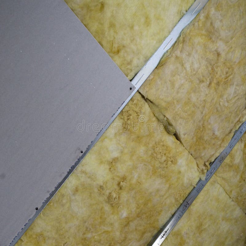 Putting up sheetrock stock image. Image of metal, insulated - 12865849