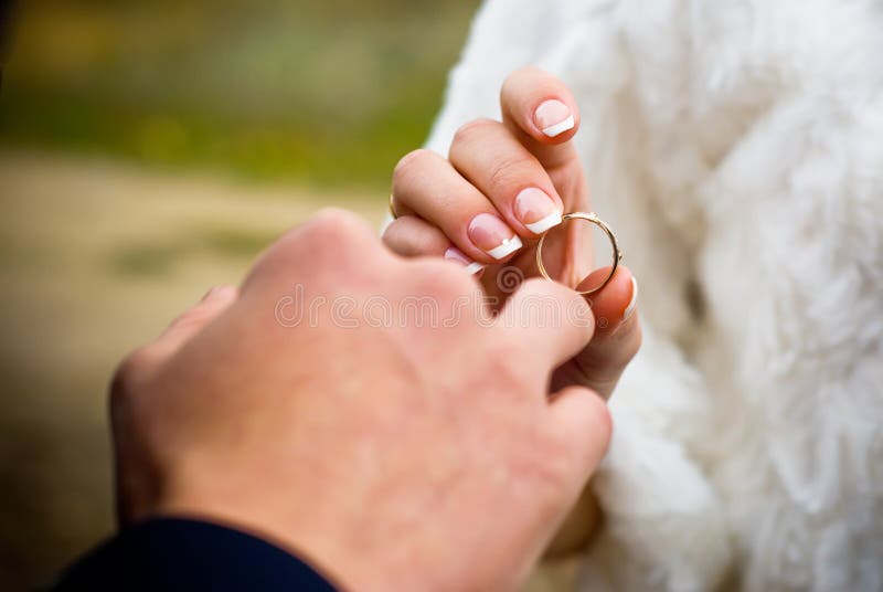 Putting On A Wedding Ring Picture. Image: 17010987