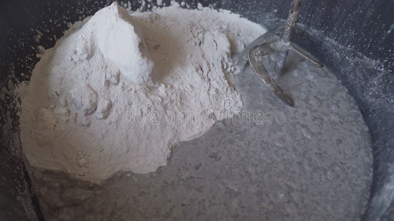 Putty - Stir in Black Bucket. Black Bucket with White Putty Mixture ...