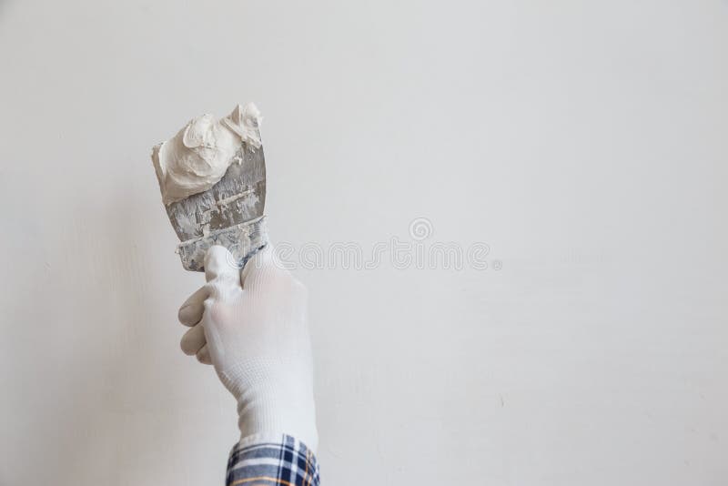 Putty the Wall Gypsum Putty with Spatulas. Stock Image - Image of ...