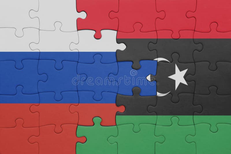 Puzzle with the Colourful National Flag of Libya and Flag of Russia ...