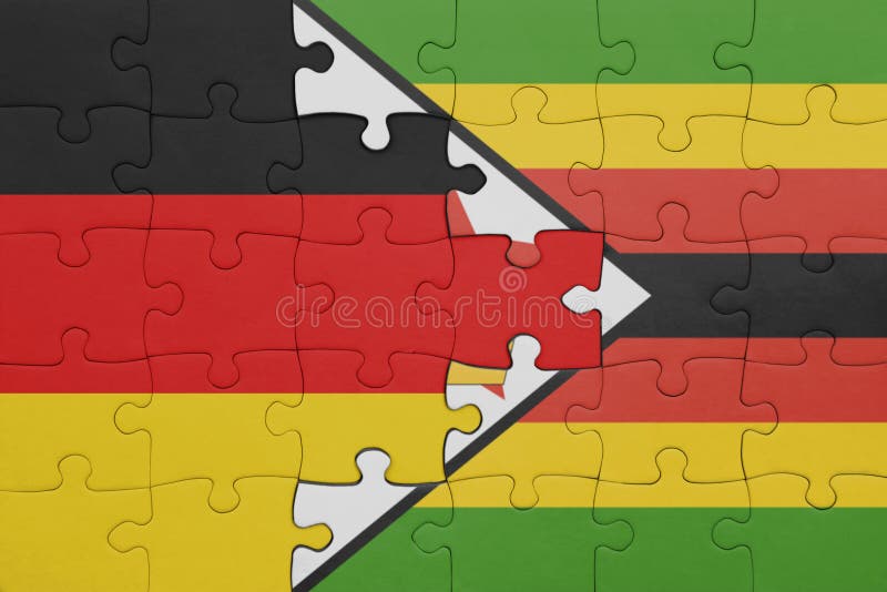 Puzzle with the Colourful National Flag of Zimbabwe and Flag of Germany ...