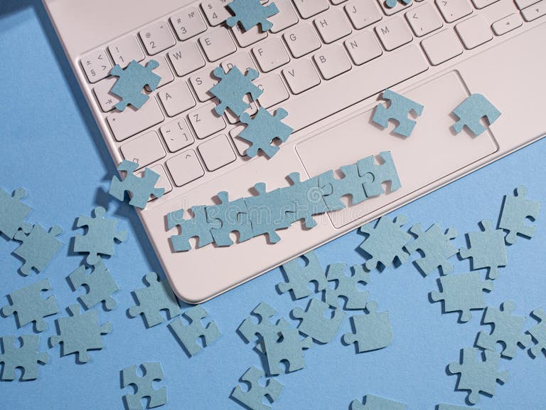 Puzzle Elements on a Laptop Keyboard, Software Development, Concept ...