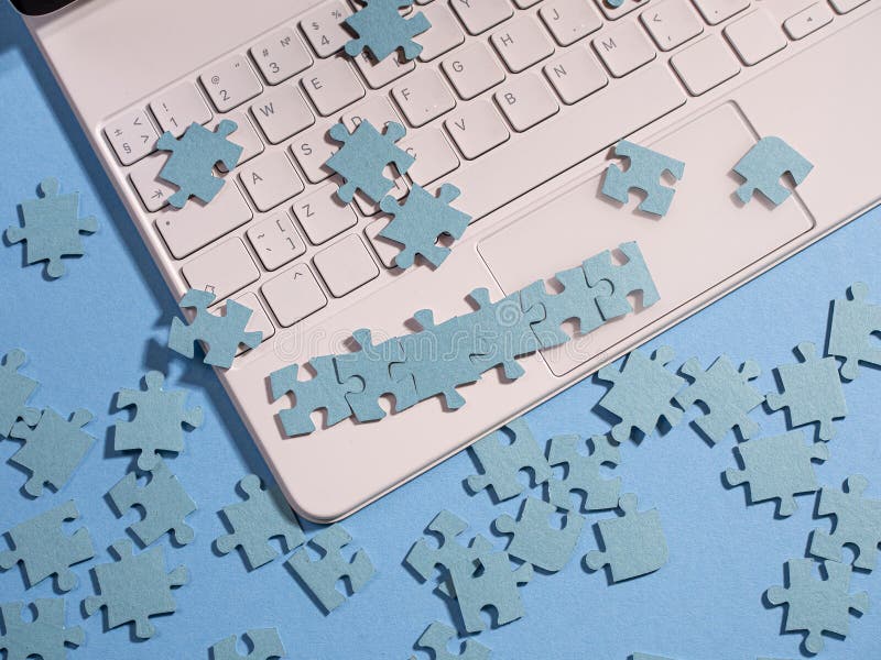 Puzzle Elements on a Laptop Keyboard, Software Development, Concept ...