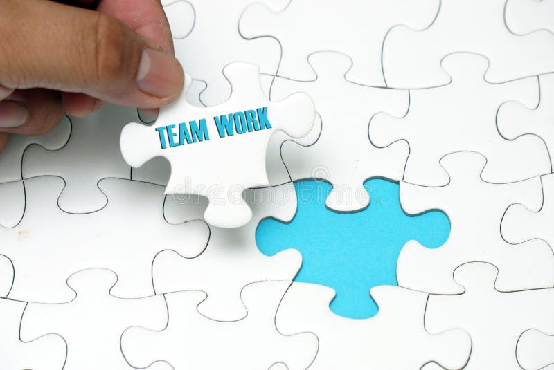Puzzle game on teamwork stock image. Image of color - 185443291