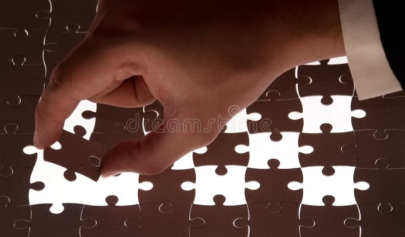 Puzzle and hand stock image. Image of challenge, decisions - 6872737