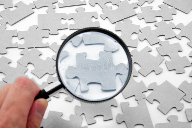 Puzzle and magnifier stock photo. Image of shape, strategies - 1461962