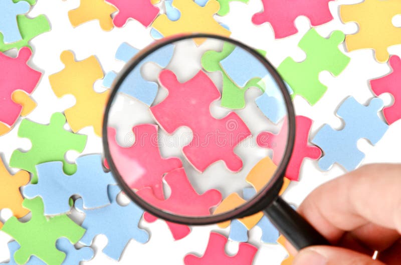 Puzzle and magnifier stock photo. Image of shape, strategies - 1461962