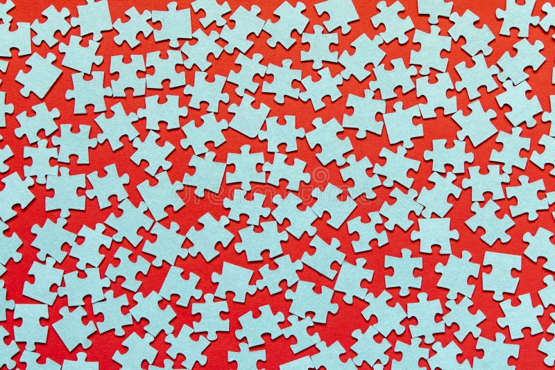 Puzzle. Many Puzzle Pieces on a Red Background Stock Photo - Image of ...