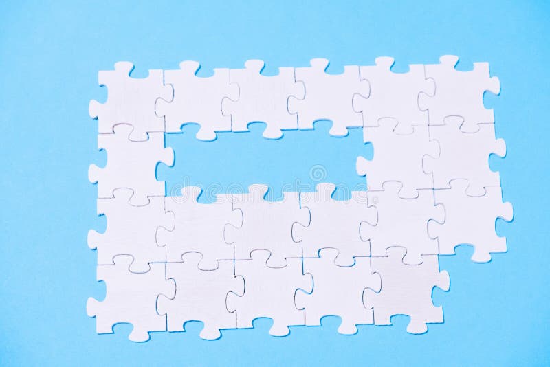 A Puzzle with a Missing Piece is Shown on a Blue Background Stock Photo ...