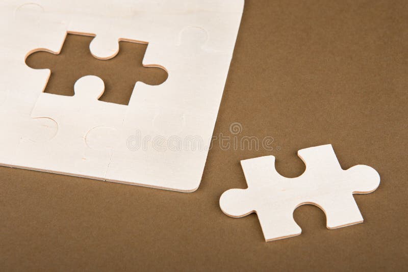 Puzzle Pieces on Brown Background Stock Image - Image of label, connect ...