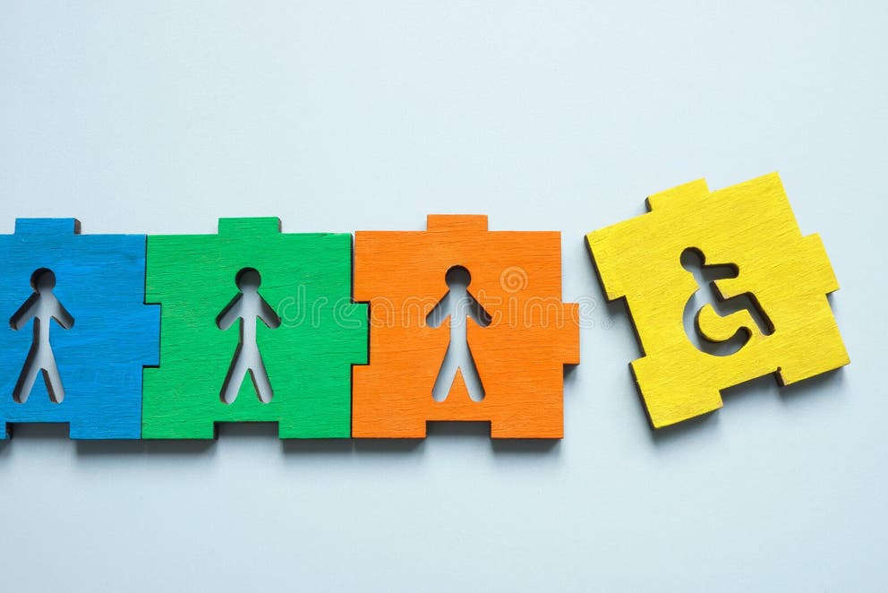 Puzzle Pieces with Figures and One Featuring a Disability Symbol ...