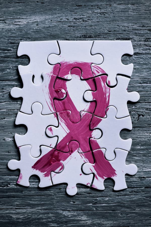 Puzzle Pieces Forming a Pink Ribbon Stock Photo - Image of raise ...