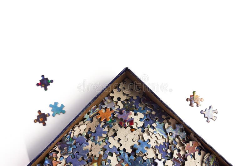 Puzzle Placed Outside the Box of Puzzle Pieces Separated Stock Photo ...