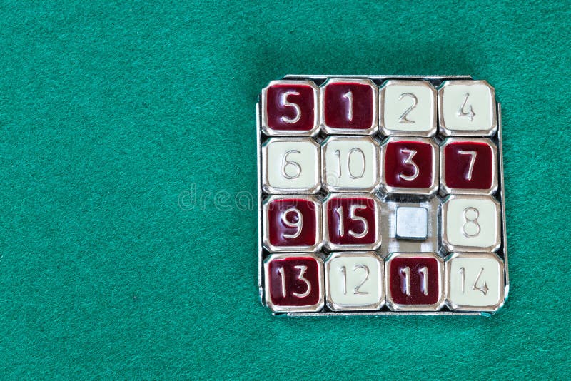 15-puzzle Sliding Puzzle Game on Green Table Stock Image - Image of ...