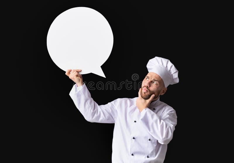 Puzzled Chef Holding White Speech Bubble Standing Over Black Background ...