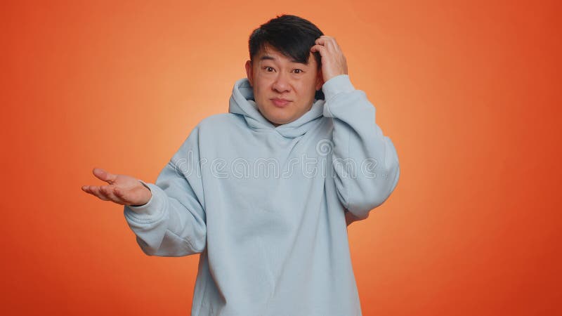 Puzzled Clueless Uncertain Man Raising Hands in Helpless, Embarrassed ...