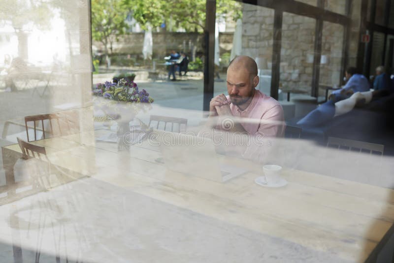 Puzzled and Concerned Male Freelancer or Student Look To Net-book Stock ... Puzzled and Concerned Male Freelancer or Student Look To Net-book Stock ...