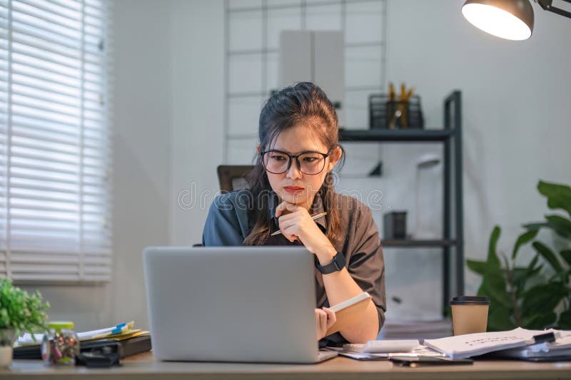 Puzzled Confused Asian Woman Thinking Hard Concerned about Online ... Puzzled Confused Asian Woman Thinking Hard Concerned about Online ...