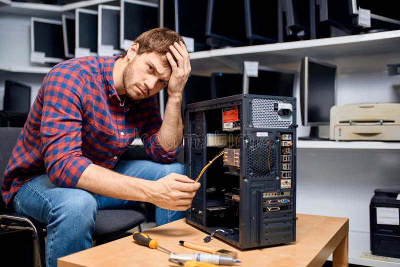 Puzzled Handsome Man Cannot Solve the Computer Problem Stock Photo ...