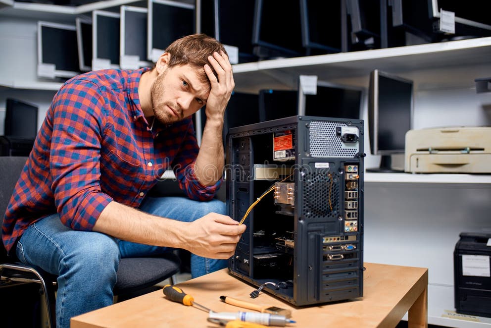 Puzzled Handsome Man Cannot Solve the Computer Problem Stock Photo ...
