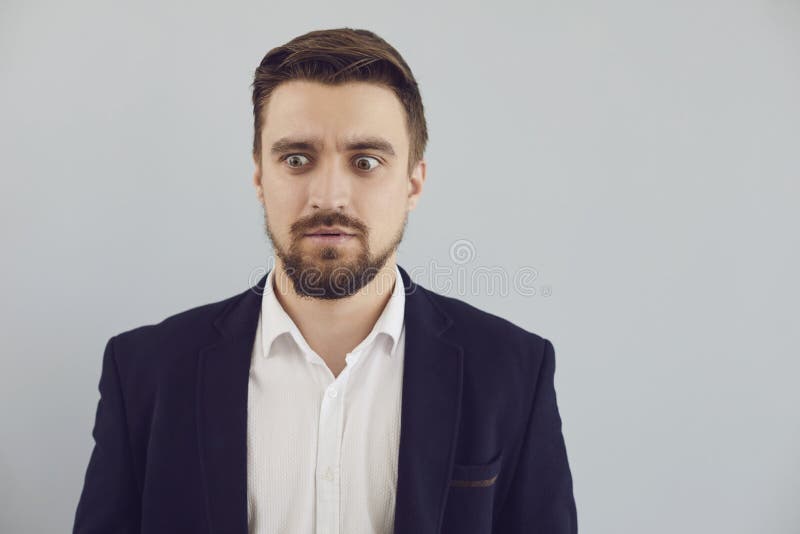 Unsure Emotion on Young Man Face Stock Photo - Image of human ...