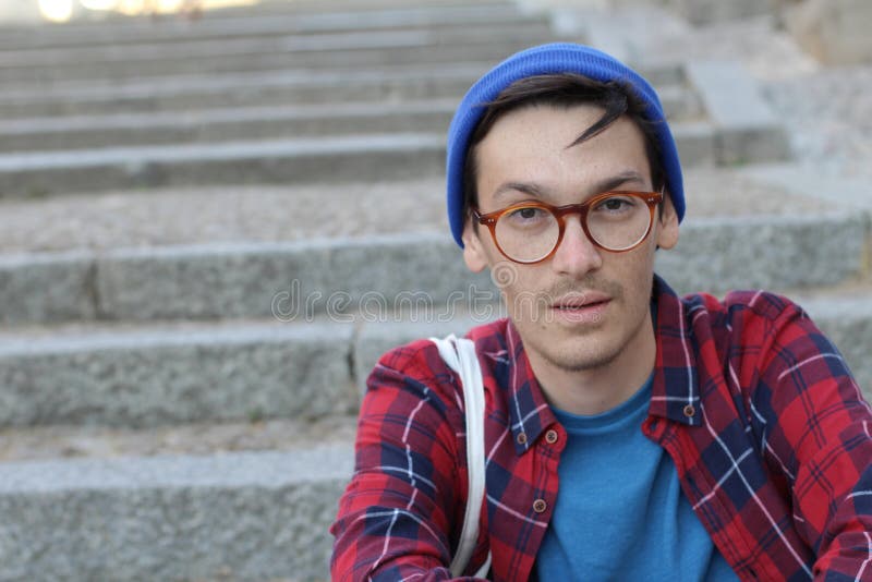 Puzzled Looking Young Man Looking at Camera Stock Image - Image of ...