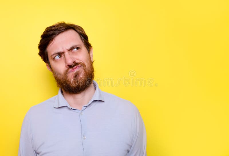 Puzzled Man Face Expression Isolated on Yellow Stock Image - Image of ...