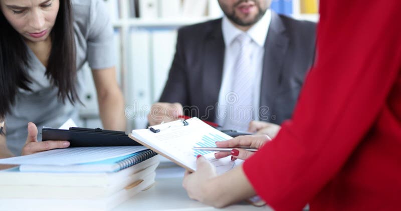 Puzzled People in the Office Look at Documents with Charts Stock Video ...