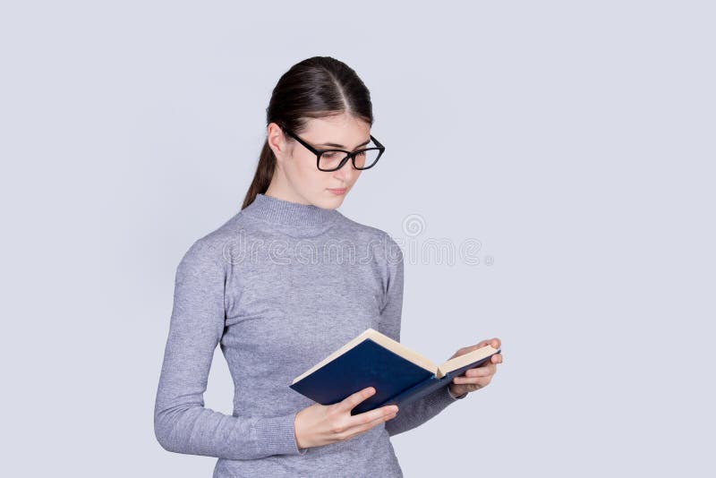 Confused Student Guy Looks Down Upset, Holding a Book with Question ...