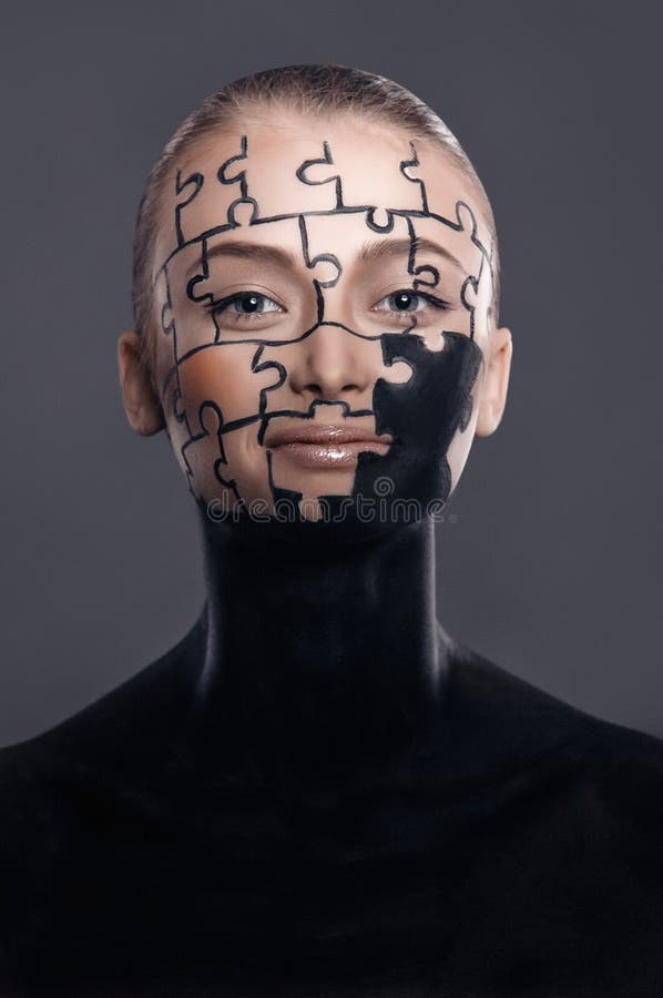 Puzzles painted on face stock photo. Image of concept - 88319740