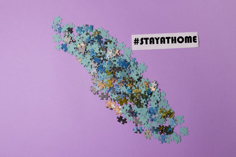 Puzzles and Paper with Hashtag Hashtag Stayathome on Purple Background ...