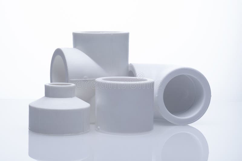 Set of Fittings for PVC Pipes and Reinforced Water Hose on a White ...