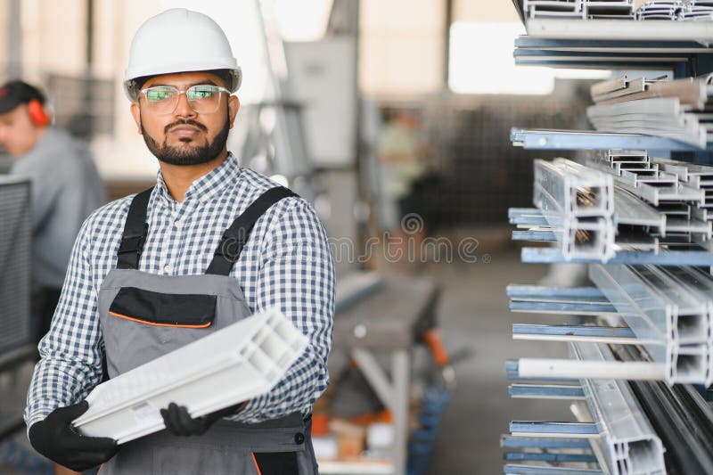 PVC Industry Worker or Operator Making Frames for Windows and Doors ...