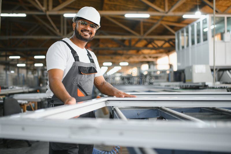 PVC Industry Worker or Operator Making Frames for Windows and Doors ...