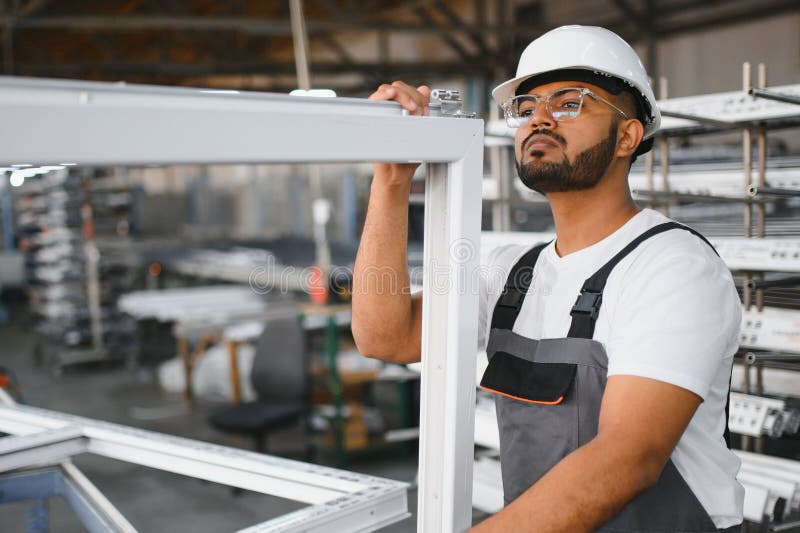 PVC Industry Worker or Operator Making Frames for Windows and Doors ...