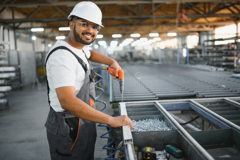 PVC Industry Worker or Operator Making Frames for Windows and Doors ...