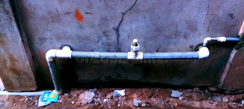 Pvc pipe laid on wall stock photo. Image of home, junction - 298509814